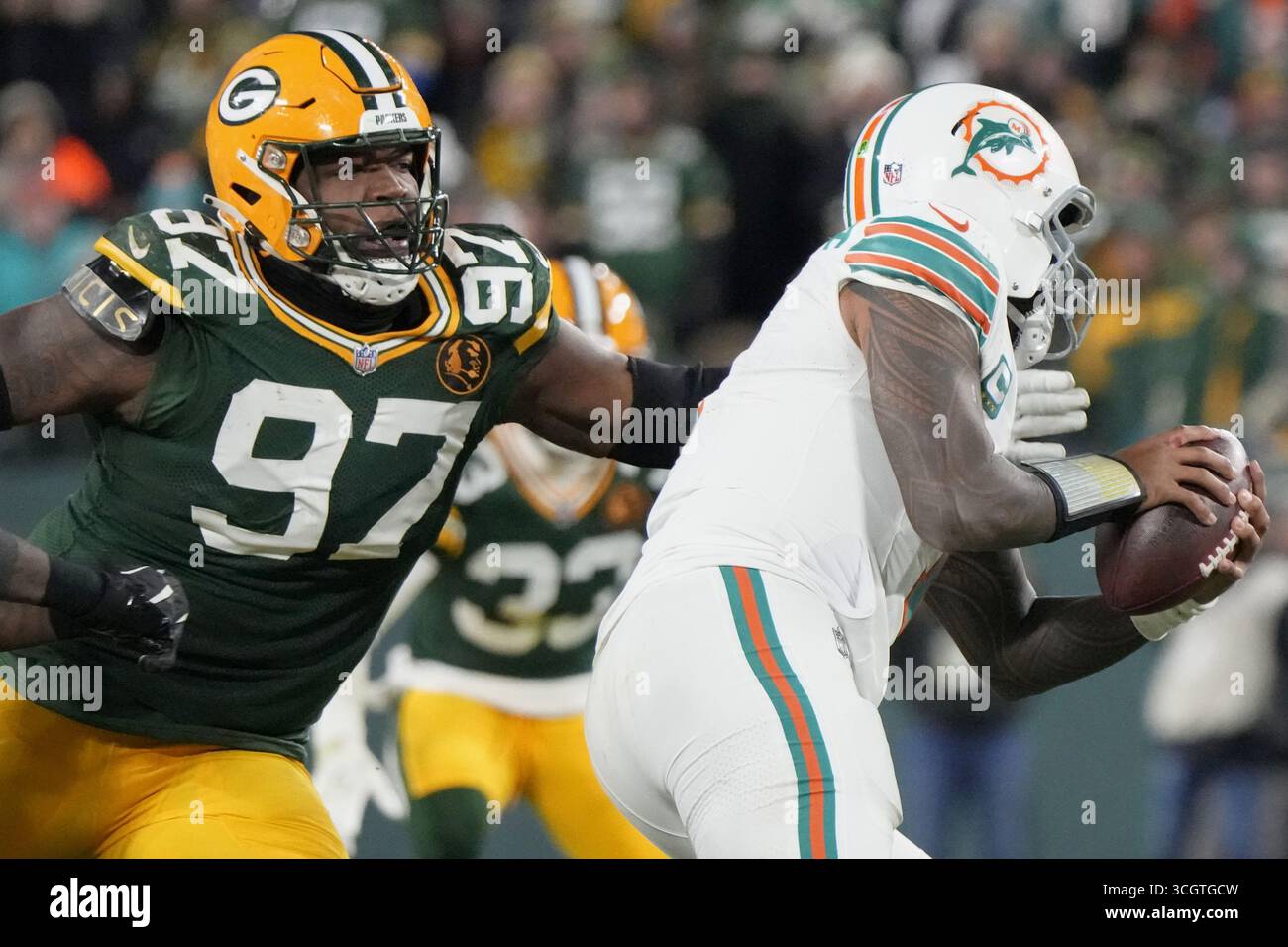 FILE - Green Bay Packers defensive tackle Kenny Clark (97) sacks Miami ...