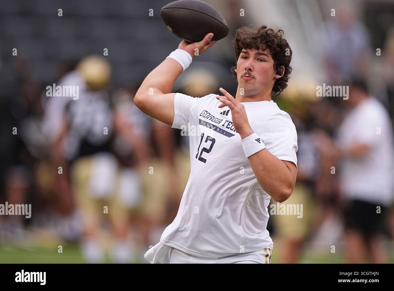 Georgia Tech quarterback Aaron Philo warms up before an NCAA college ...