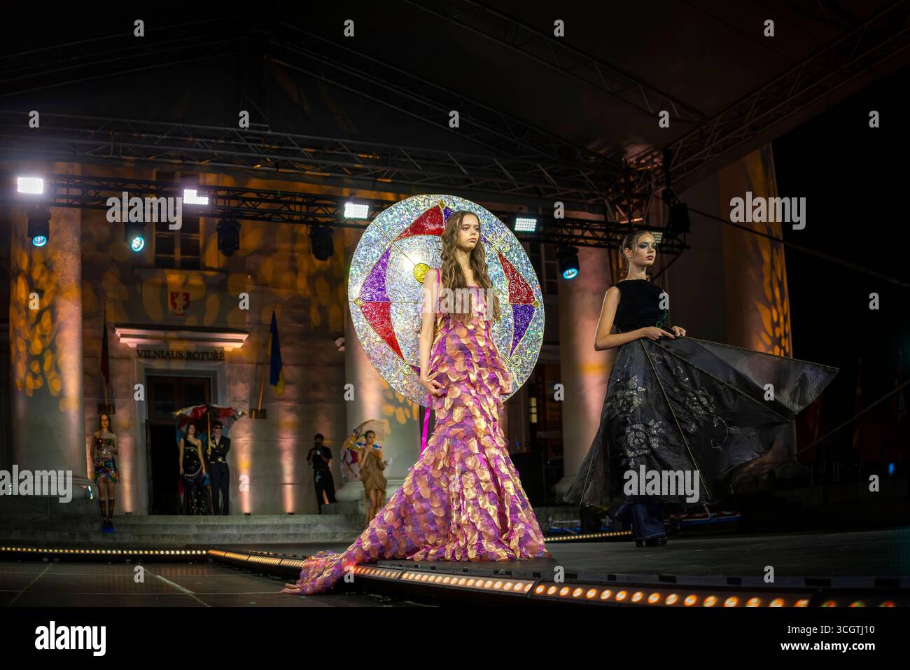 Models wear creations by Lithuanian designer Evelina Lukinych on a runway during Vilnius ...