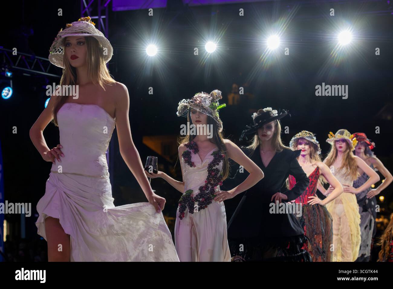 Models wear creations by Lithuanian designer Kristina Savarauskaite on a runway at Vilnius ...