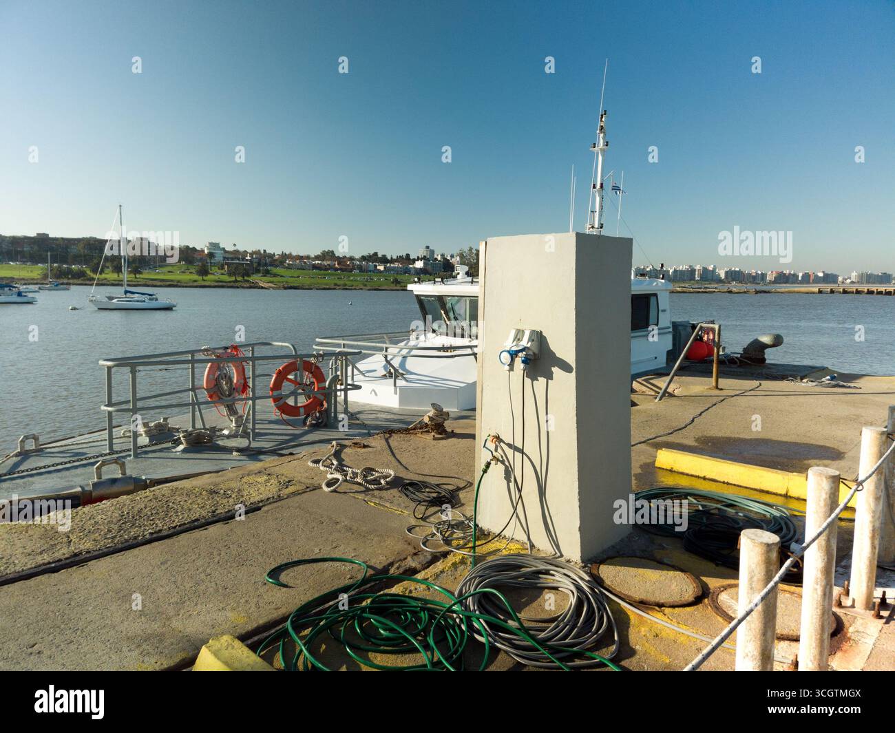 Boats connected to charging cables hi-res stock photography and images ...