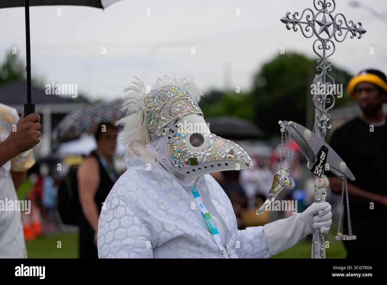 A plague doctor actor attends the Hurricane Katrina memorial in the Lower Ninth Ward. Twenty ...