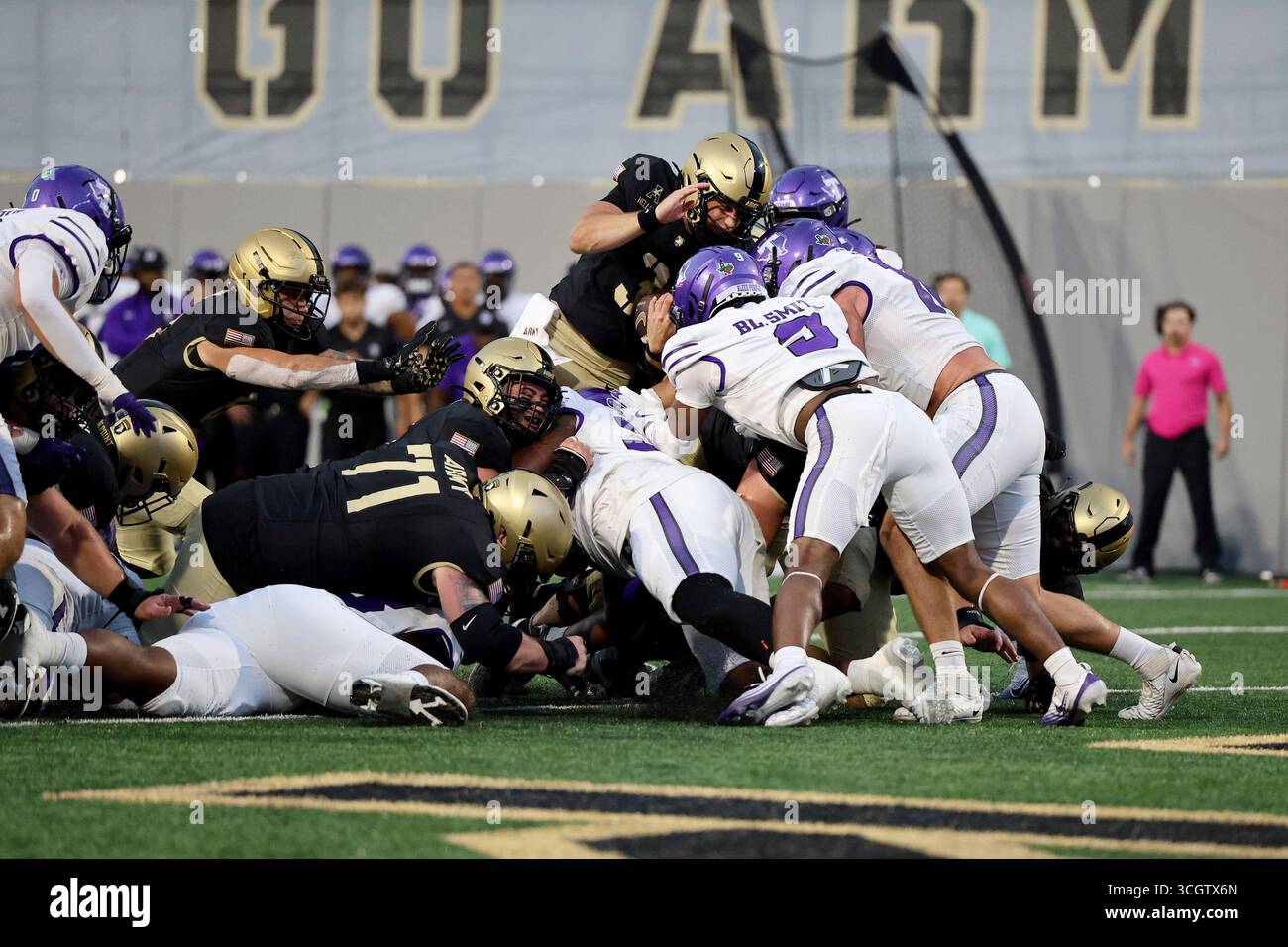 Army QB Cale Hellums (3) scores a touchdown against Tarleton State ...