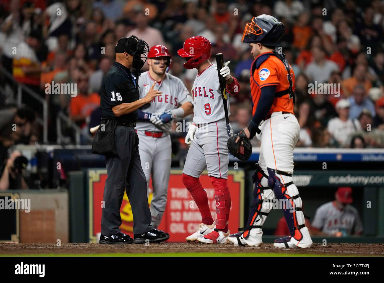 Los Angeles Angels' Zach Neto (9) disputes a call with umpire Vic ...