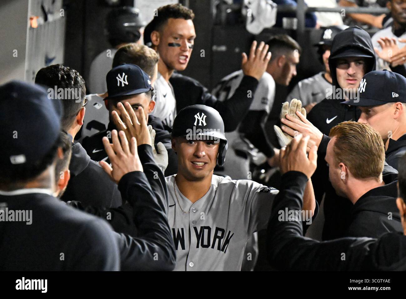 New York Yankees' Anthony Volpe celebrates in the dugout after hitting ...