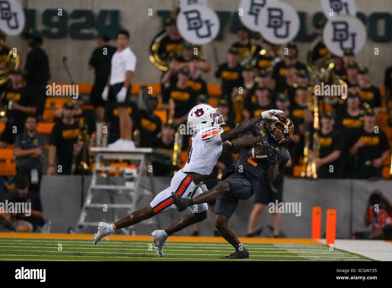 Baylor wide receiver Kole Wilson, right, makes a catch against Auburn ...