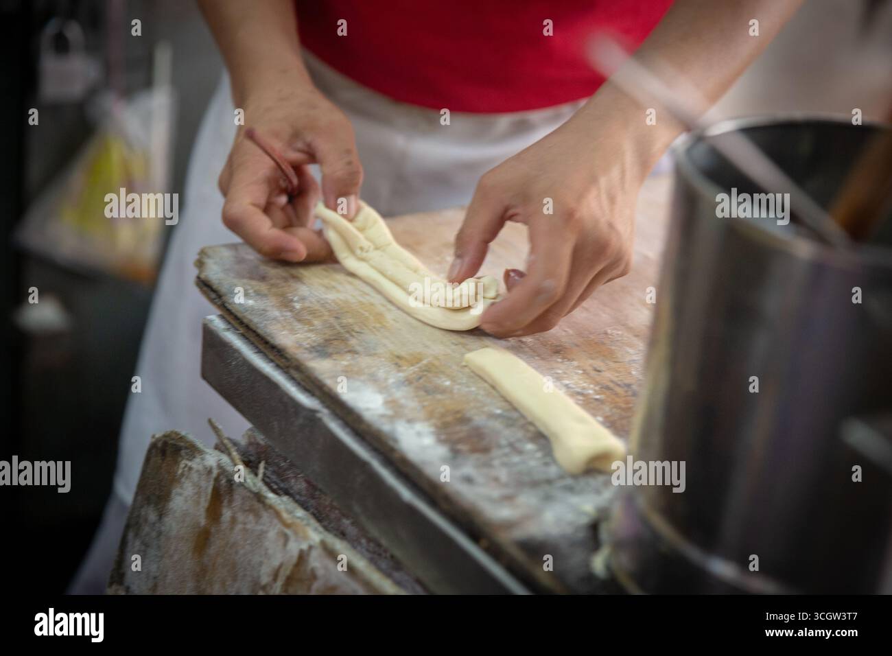 Donut fryer hi-res stock photography and images - Alamy