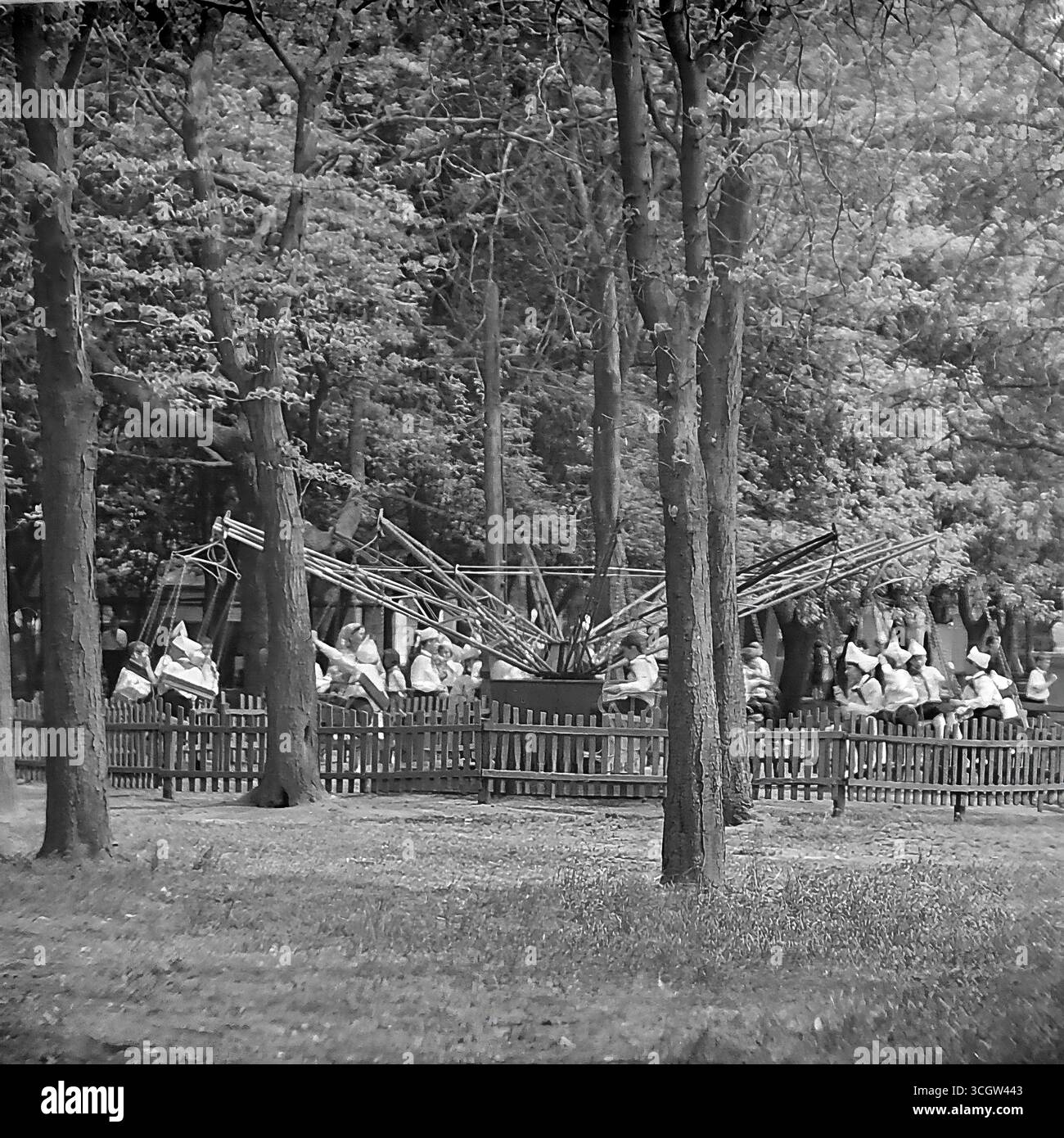 An archival photo of the classic Soviet "Romashka" (Chamomile) carousel ...