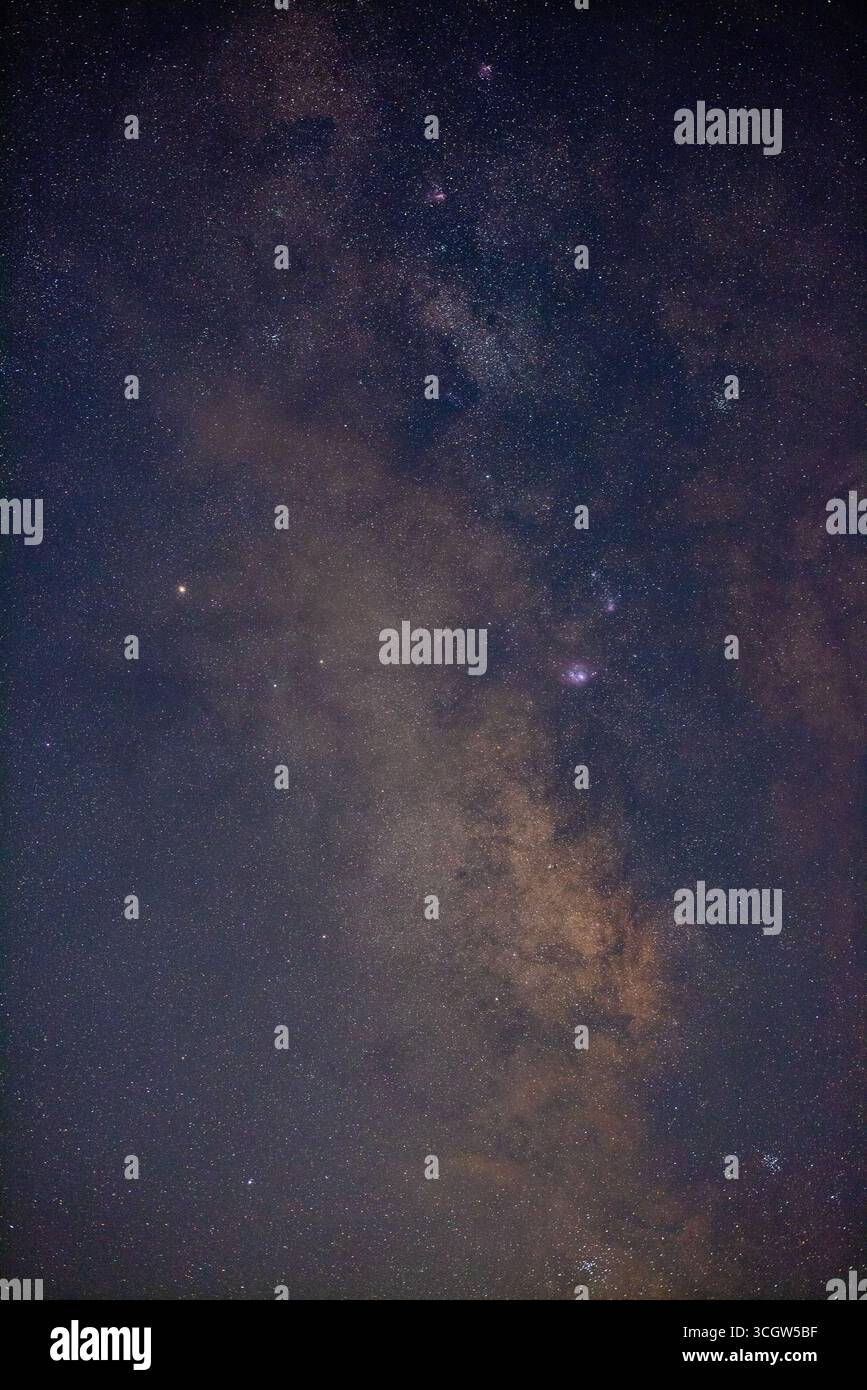 Countless sparkling stars illuminate the deep dark night sky, revealing ...