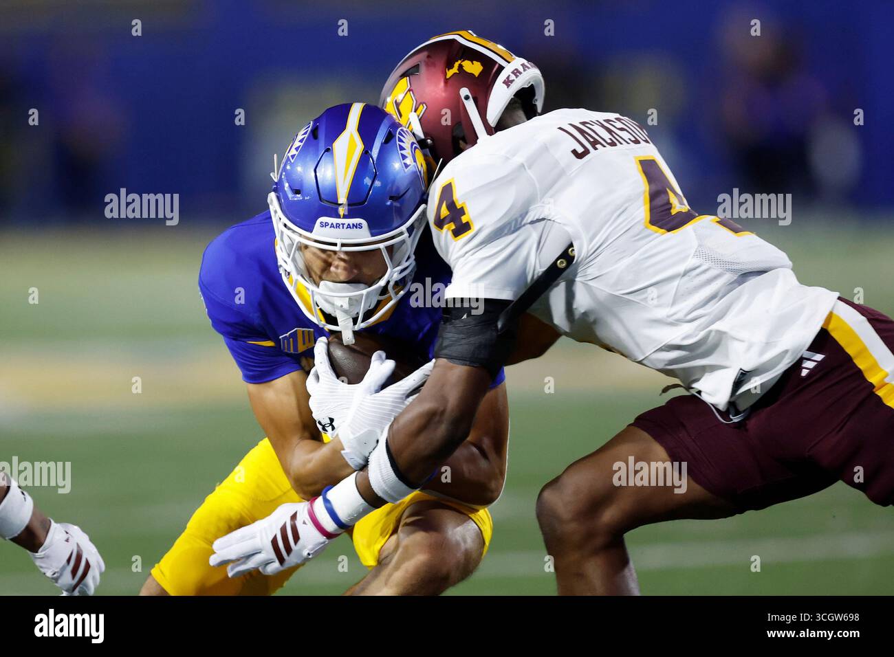 San Jose State wide receiver Matthew Coleman (14) is tackled by Central ...