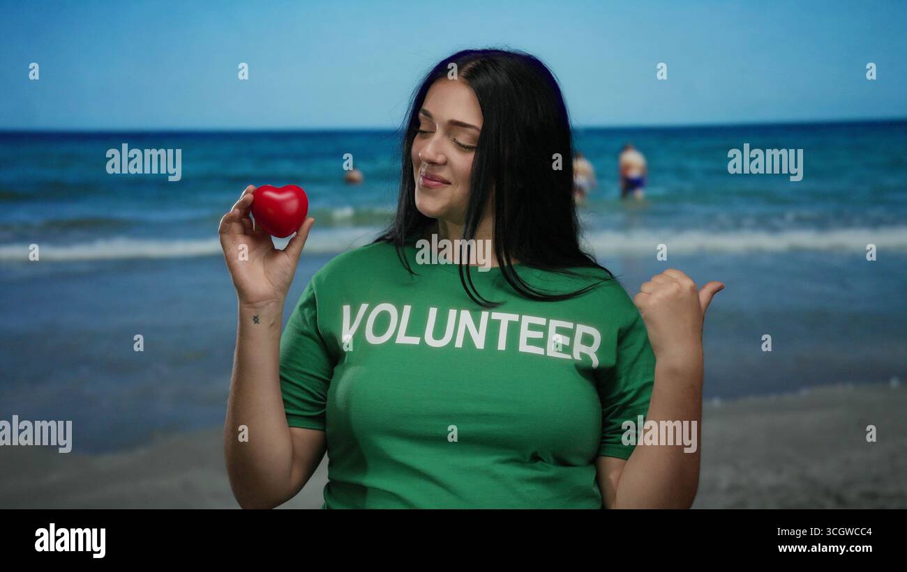 Woman volunteer heart toy seaside hi-res stock photography and images ...