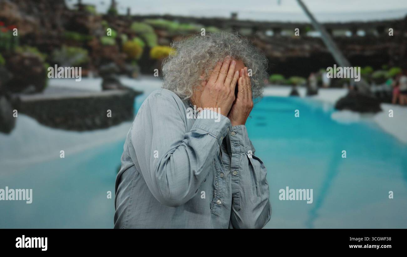 Woman curly grey hair resort hi-res stock photography and images - Alamy