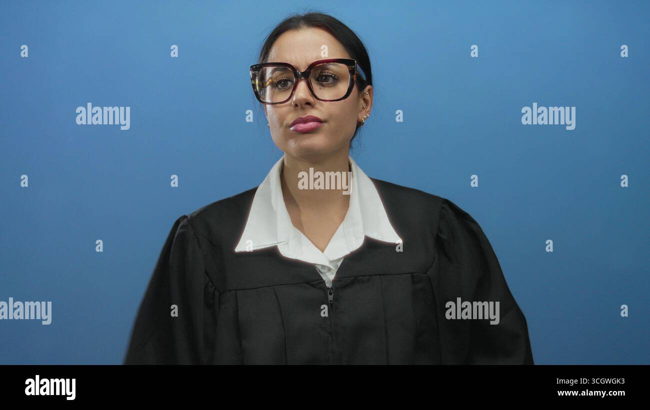 Woman wearing judge uniform yawning with hand over mouth against blue ...