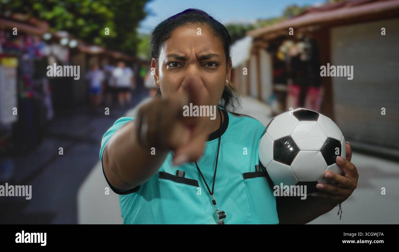 African american woman referee raises hi-res stock photography and ...