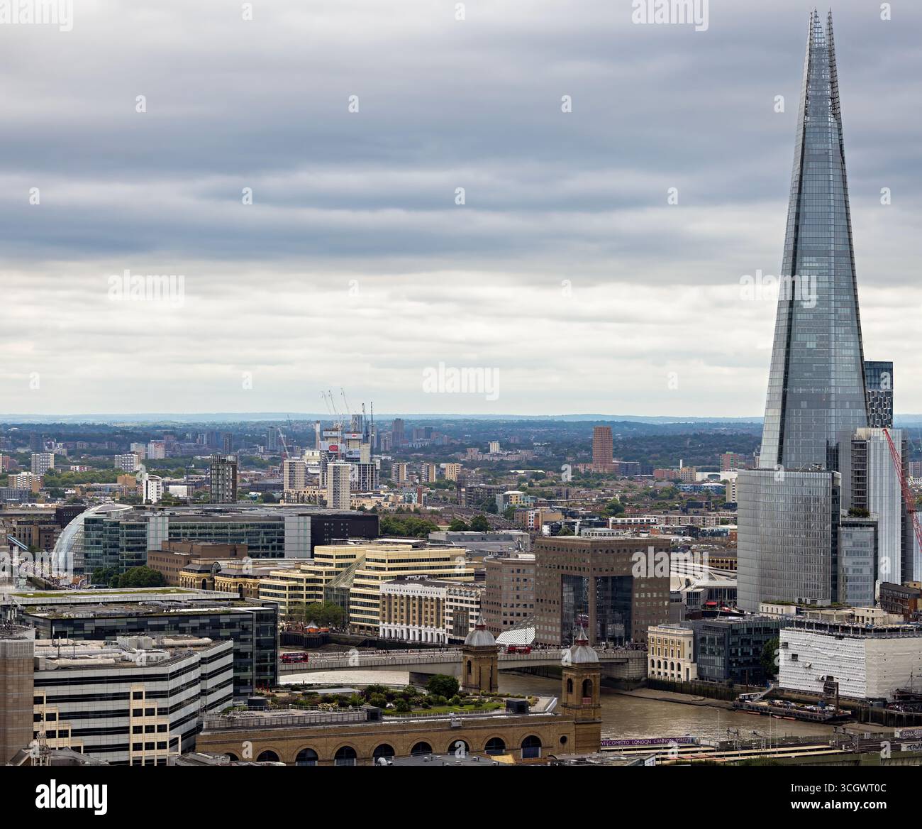 Panoramic skyline of London with The Shard rising over the River Thames ...