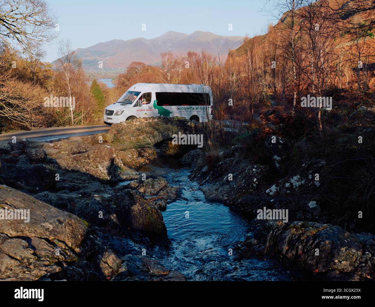 Mountain Goat Tour bus crossing over the narrow Ashness Bridge ...