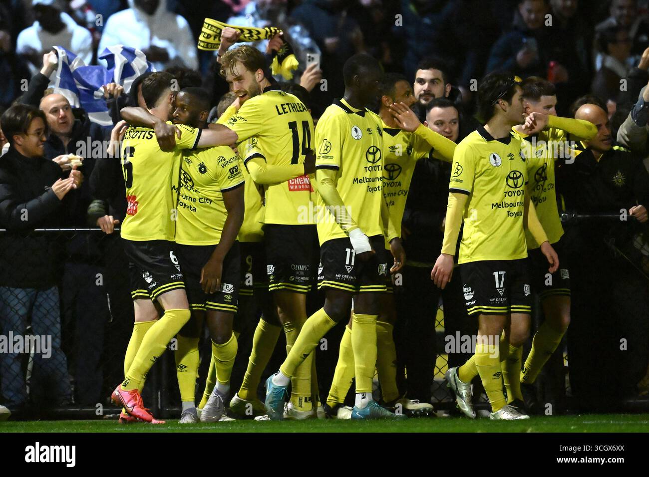 Bul Juach of Heidelberg United celebrates scoring a goal with teammates ...