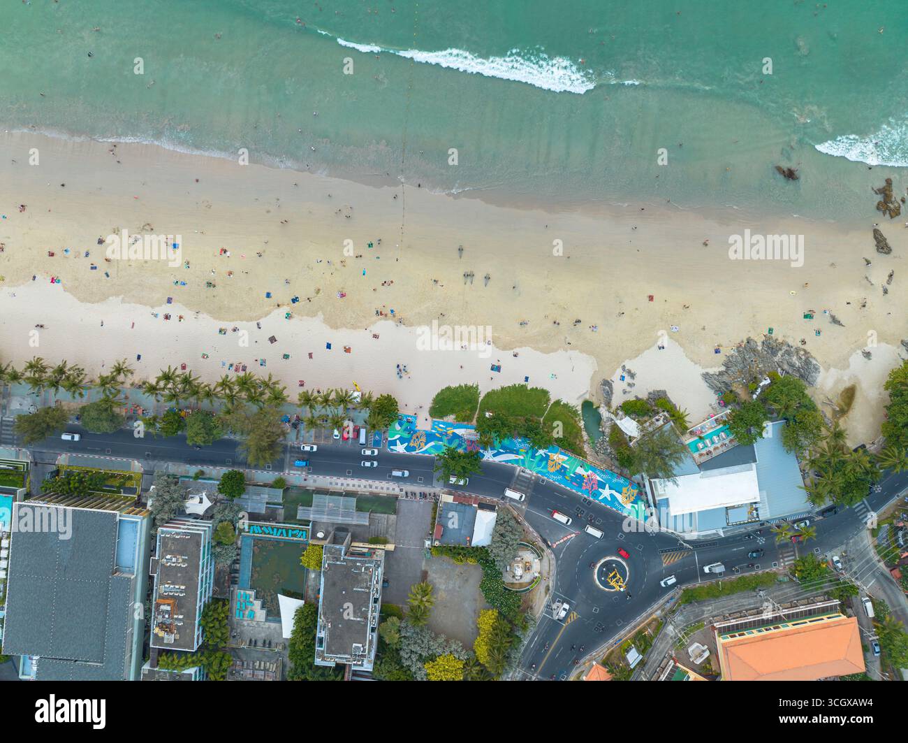 Aerial top view over Patong beach dolphin circle. The dolphin ...