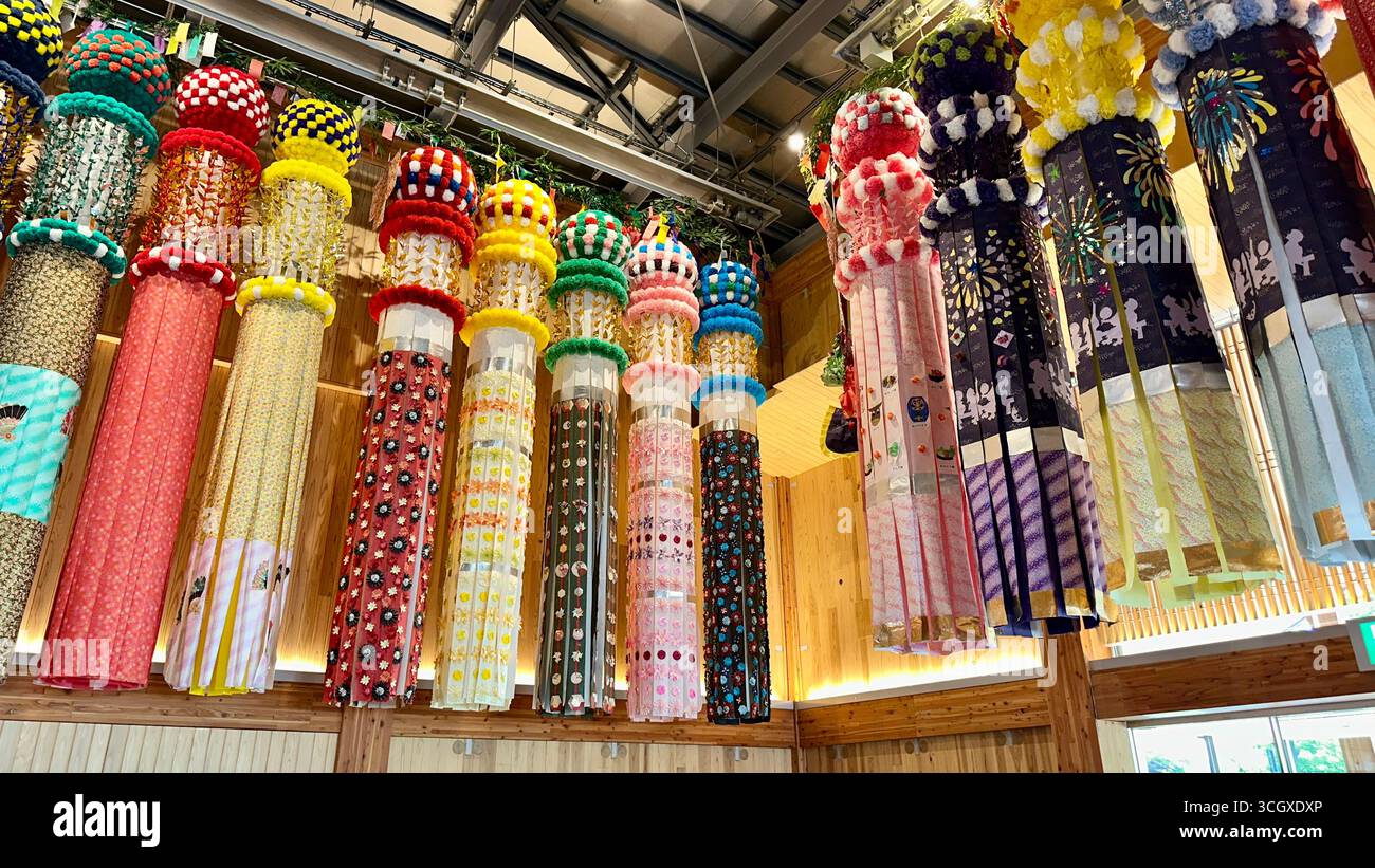 Colorful Tanabata streamers hanging indoors during festival in Sendai ...