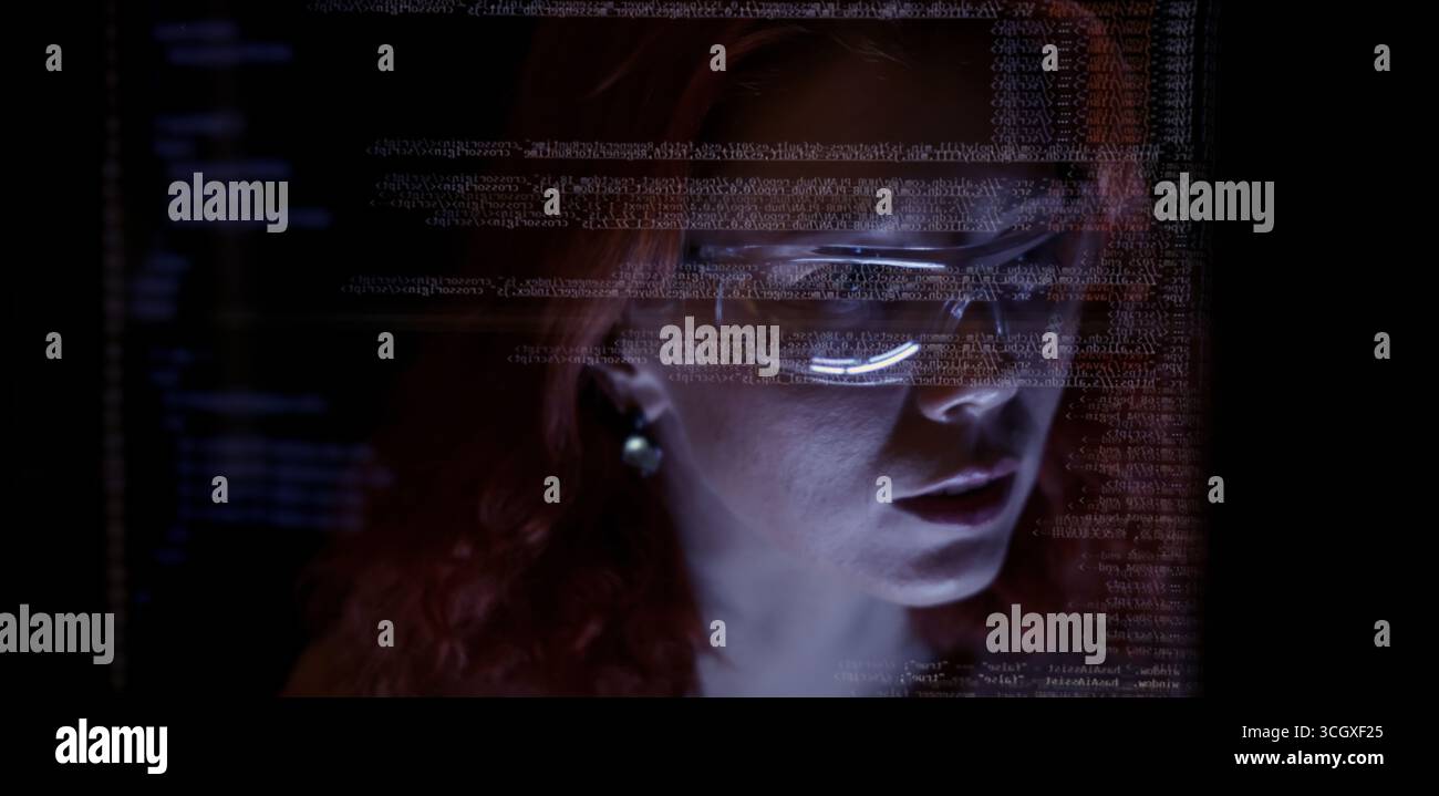 Programmers and coding. Programmer or Developer working in dark room with computer code ...