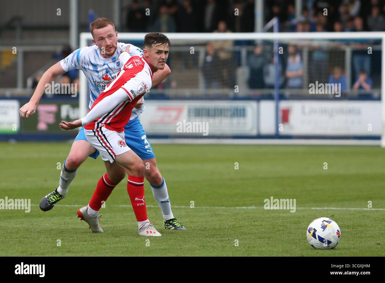 Mark Helm Of Fleetwood Town blocks Lewis Shipley during the Sky Bet ...
