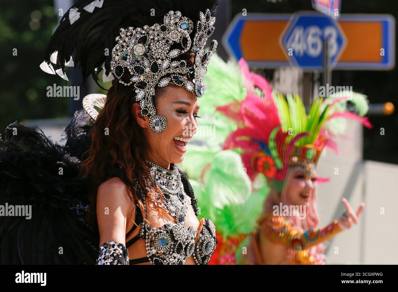 Samba dancers perform through the streets of the traditional Asakusa ...