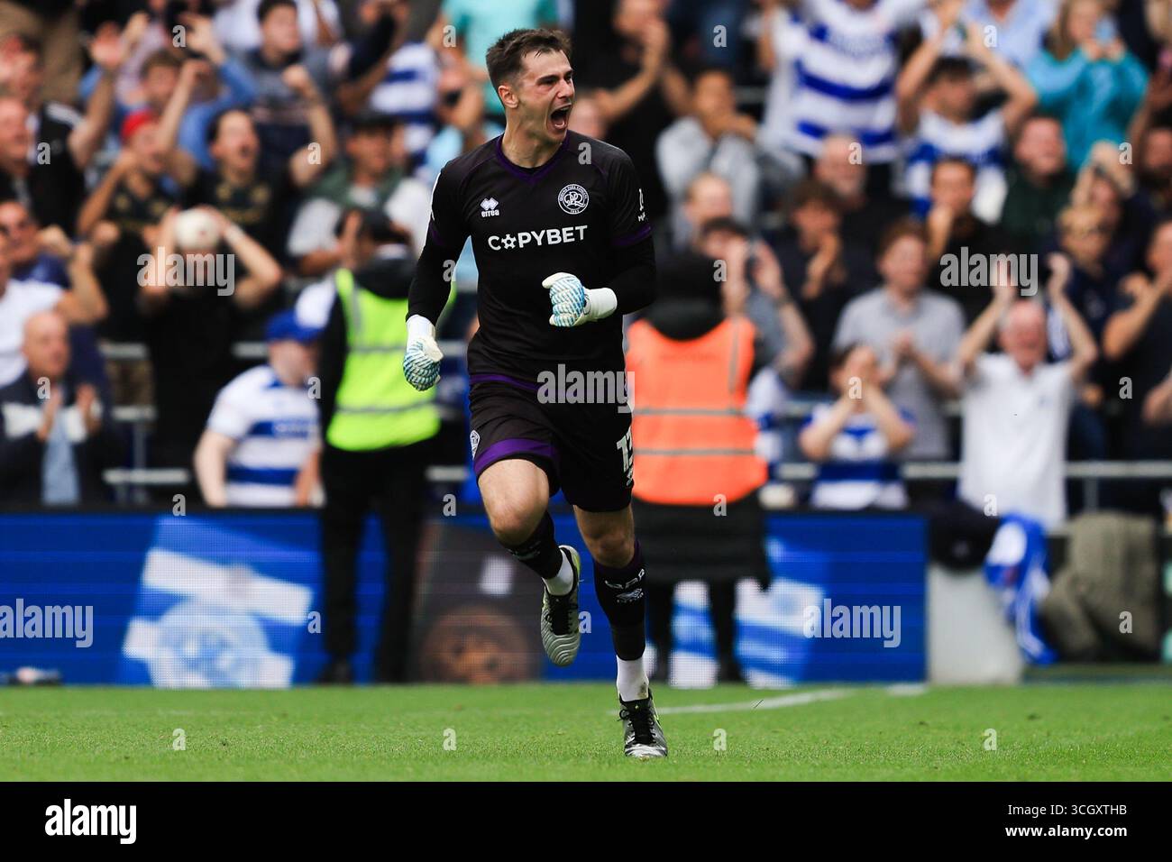 Queens Park Rangers goalkeeper Joe Walsh celebrates his side's third ...