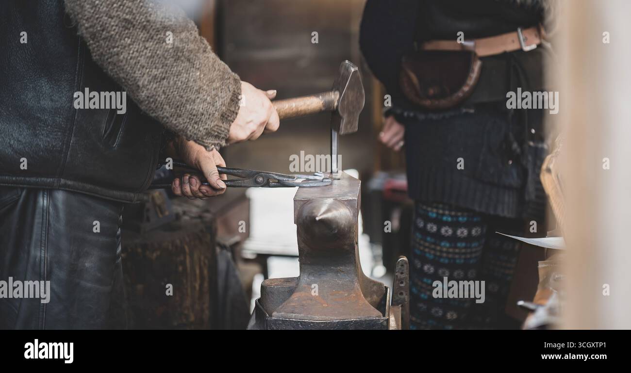 Medieval blacksmith hands process hi-res stock photography and images ...