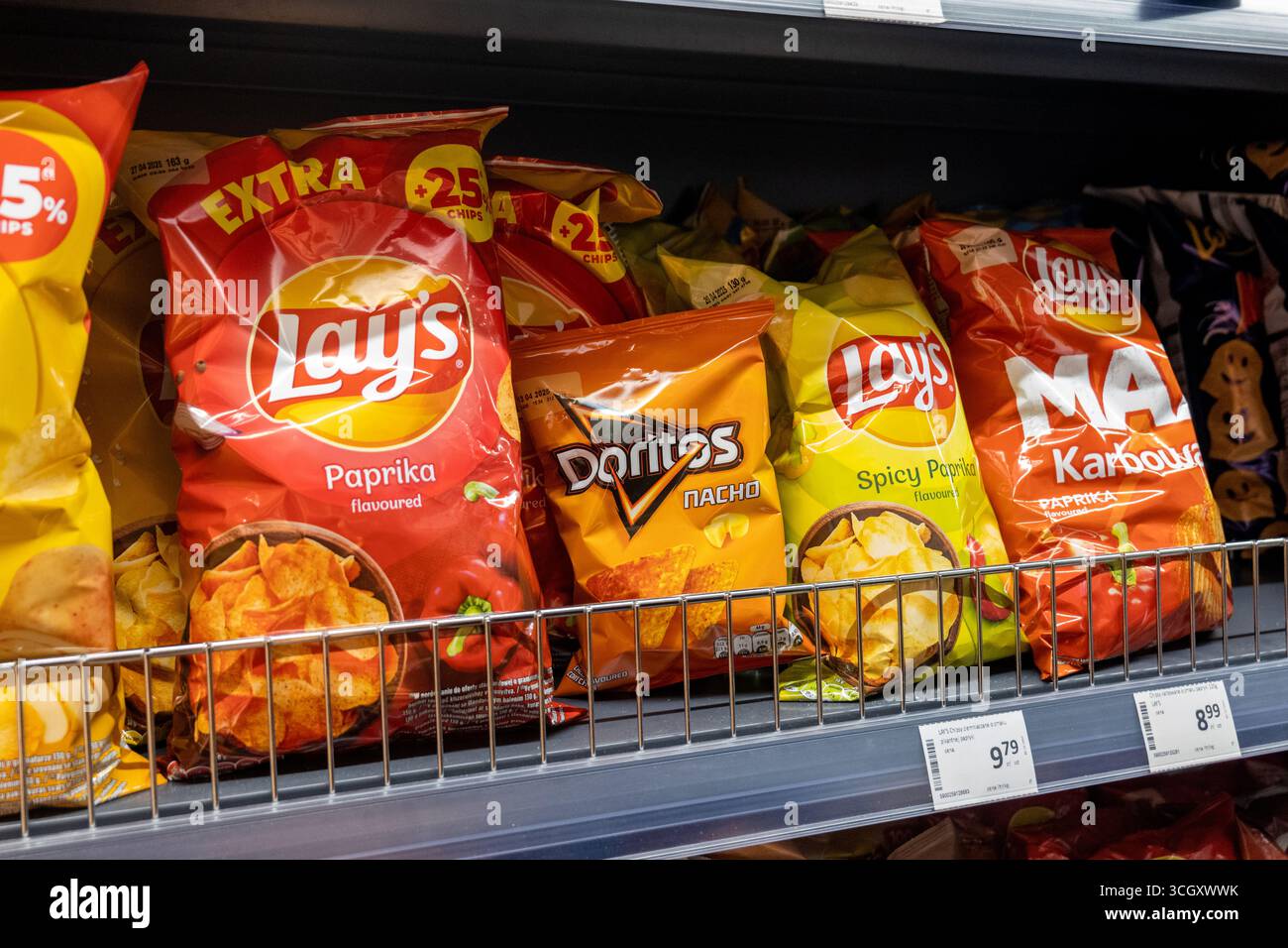 Lay’s and Doritos potato chips packs on a supermarket shelf, paprika ...