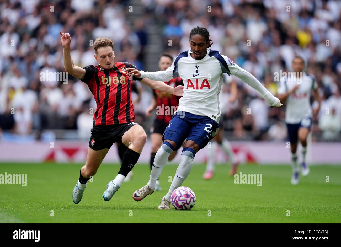 Bournemouth's David Brooks (left) and Tottenham Hotspur's Djed Spence ...