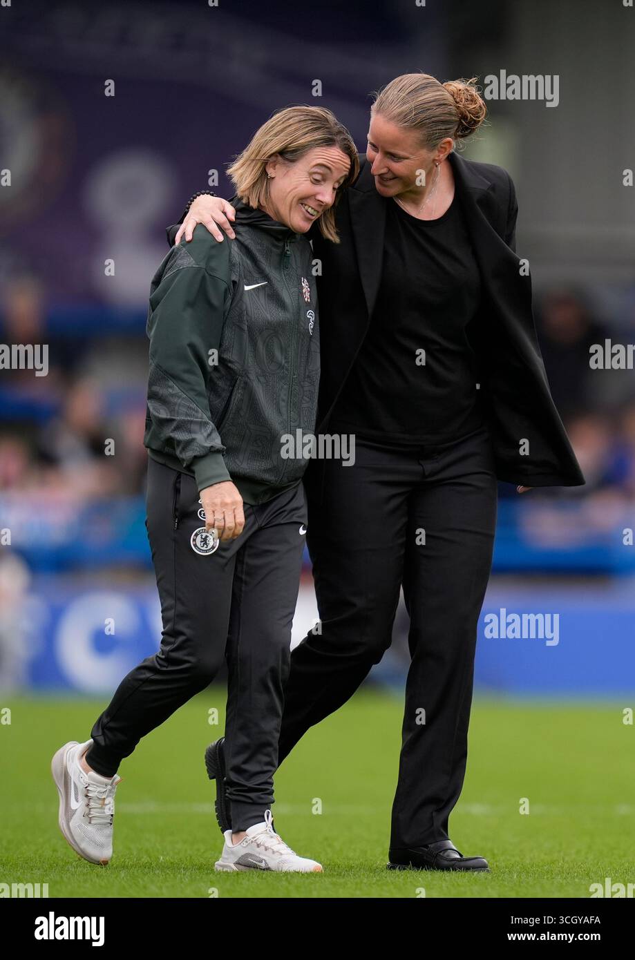 Chelsea head coach Sonia Bompastor (left) and AC Milan head coach Suzanne Bakker after the pre ...
