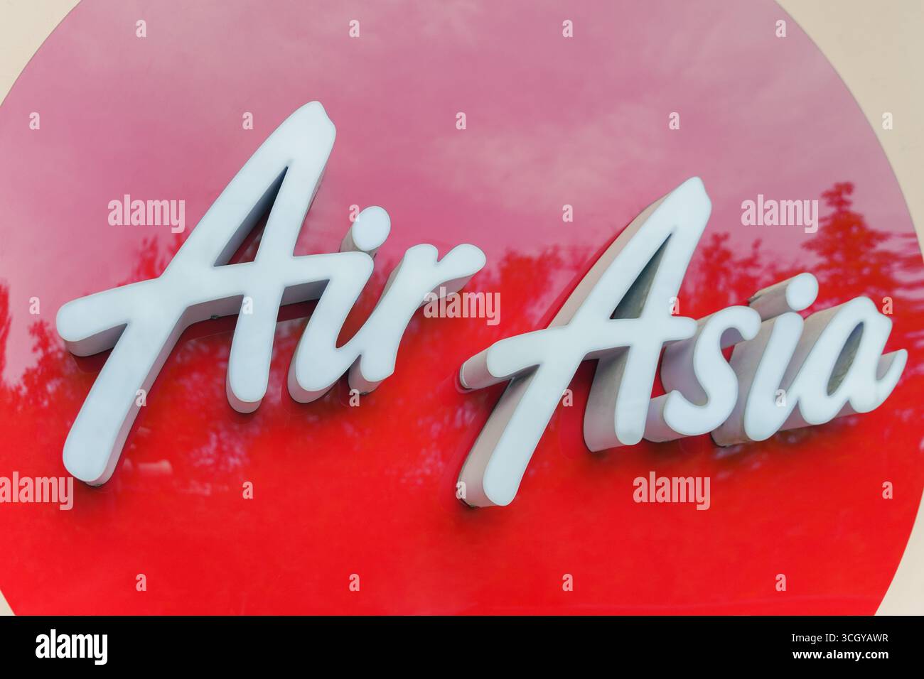Almaty, Kazakhstan - July 15, 2025: AirAsia logo on the wall of a ...