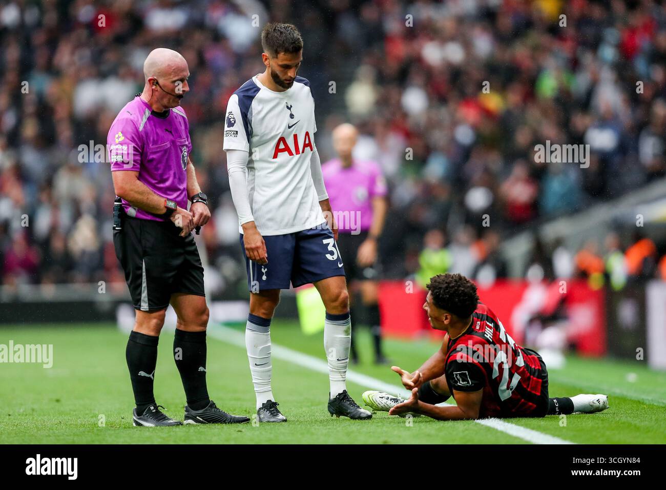 ***EDITORS NOTE - graphic content*** Referee Simon Hooper speaks to ...
