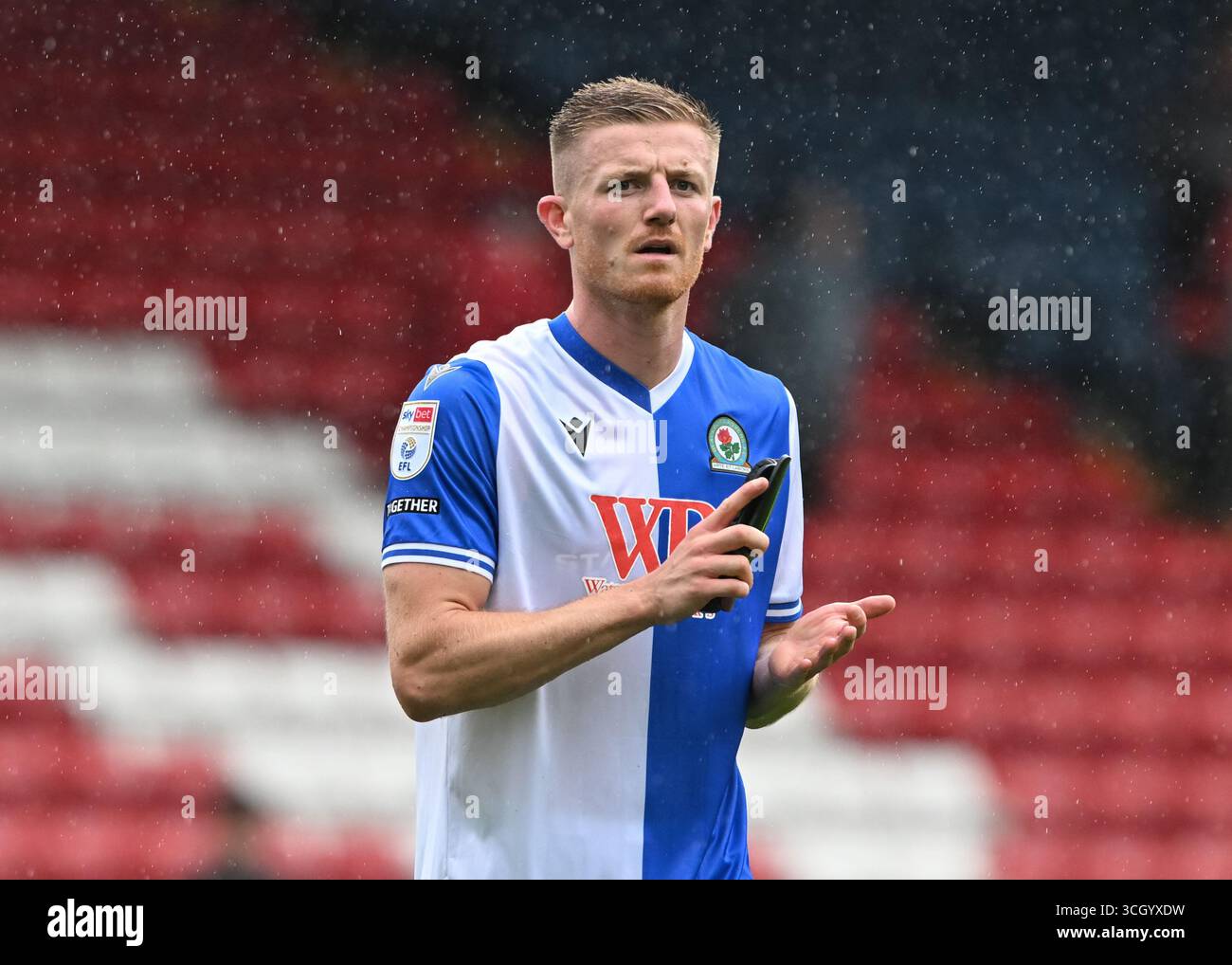 Blackburn Rovers' Scott Wharton applauds the fans at full time ...