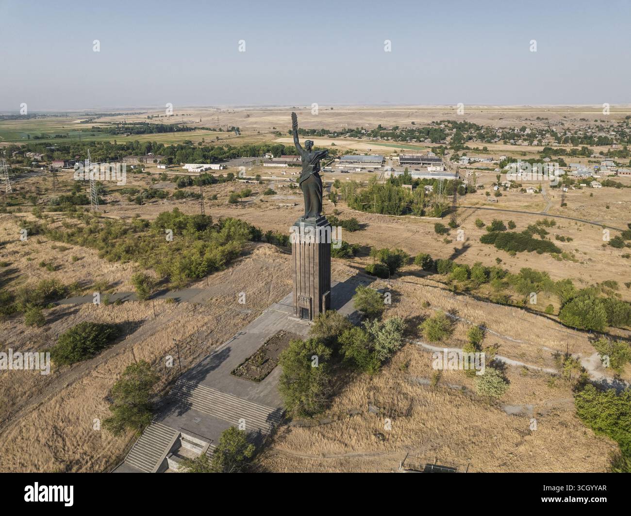 Aerial view of the Mother Armenia statue standing tall on a stone ...
