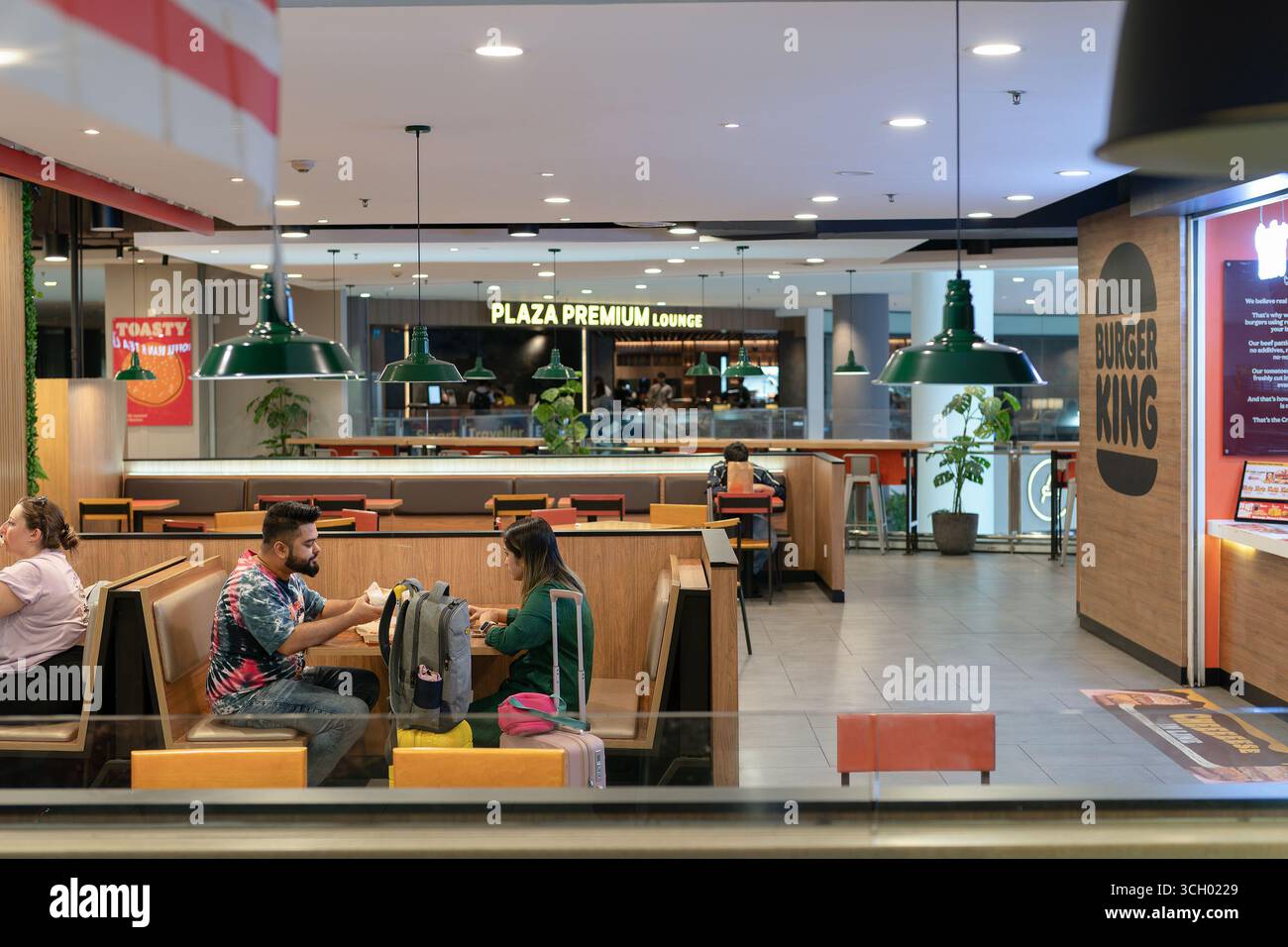 Sepang, Malaysia - September 6, 2024: Customers dining in the seating ...