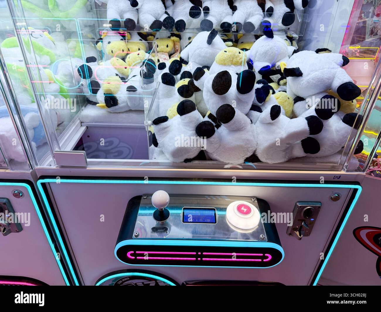 Cute doll in machine hi-res stock photography and images - Alamy