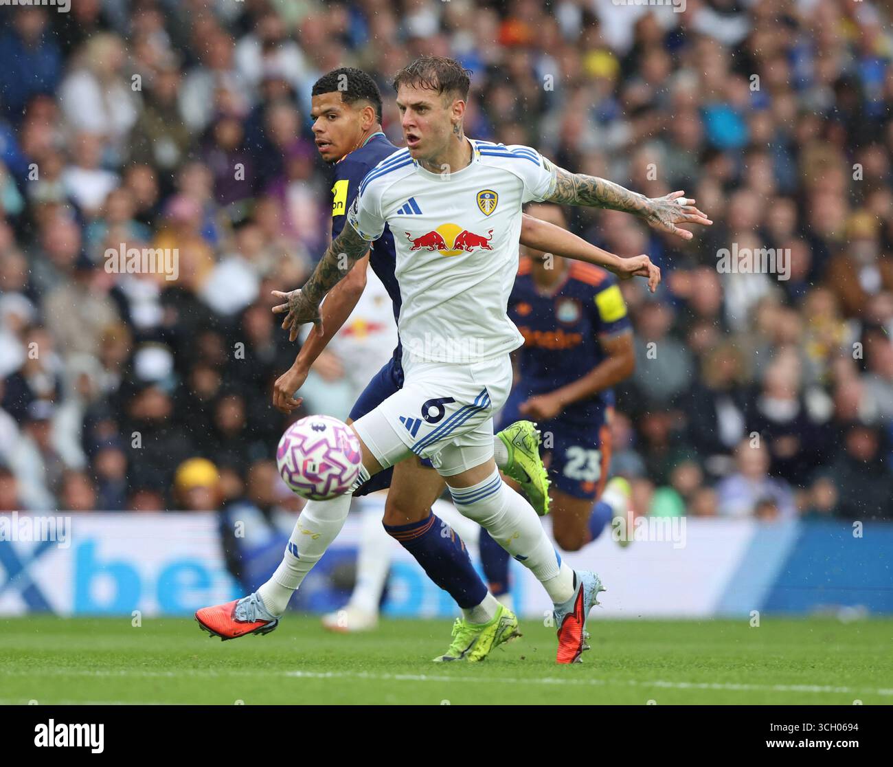 Leeds, England, 30th August 2025. Joe Rodon (R) of Leeds United in ...