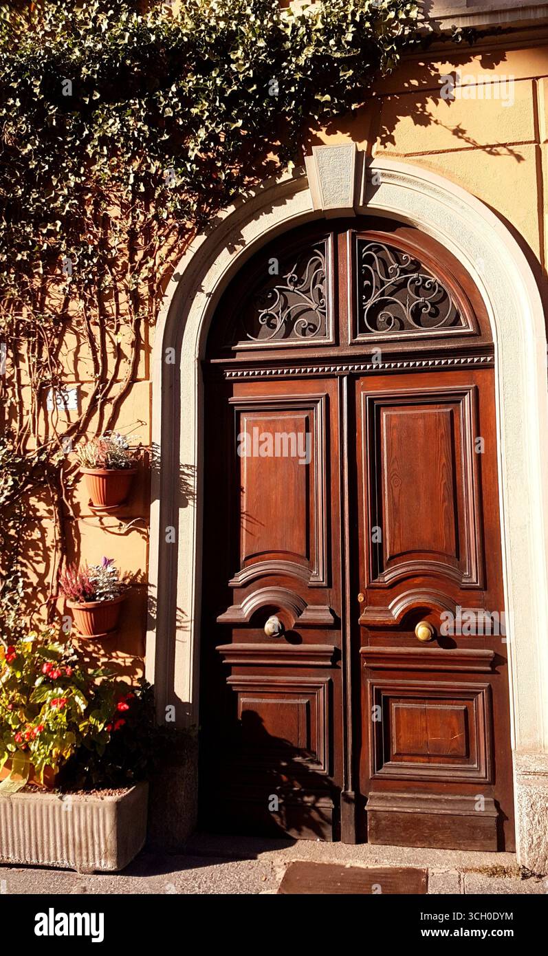 Beautiful Spanish manor house door with an arched entrance made of fine ...