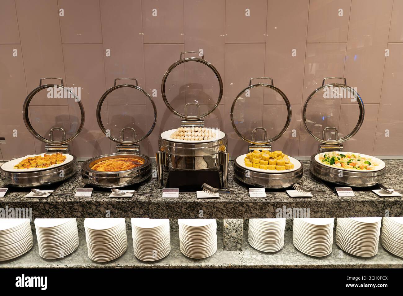Kuala Lumpur, Malaysia - September 16, 2024: a hot food buffet station ...