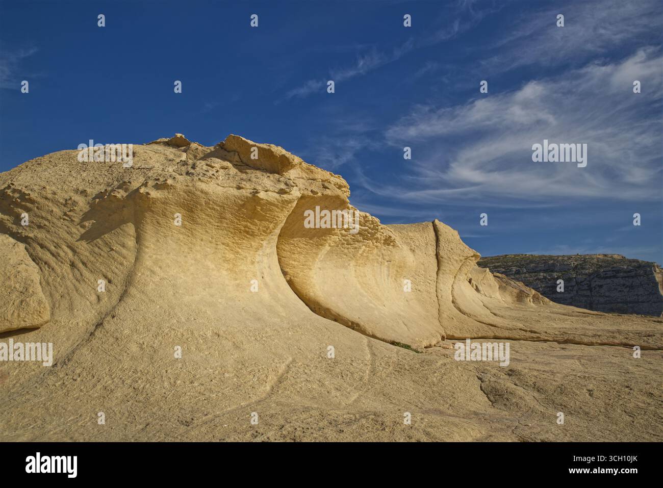 Sand-colored limestone formations located in Dwejra on the island of ...