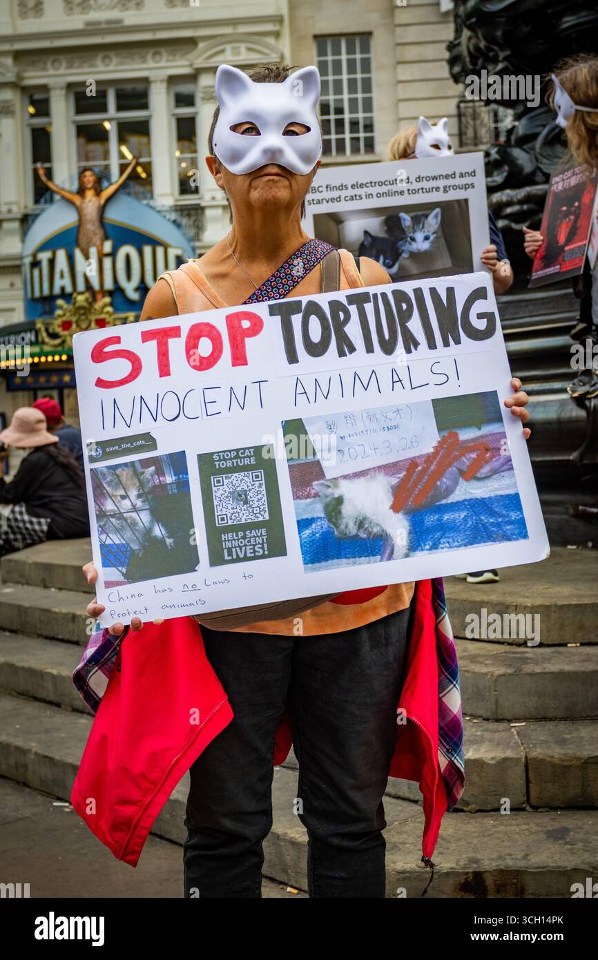 Animal rights activists gathered beneath the Eros statue at Piccadilly ...
