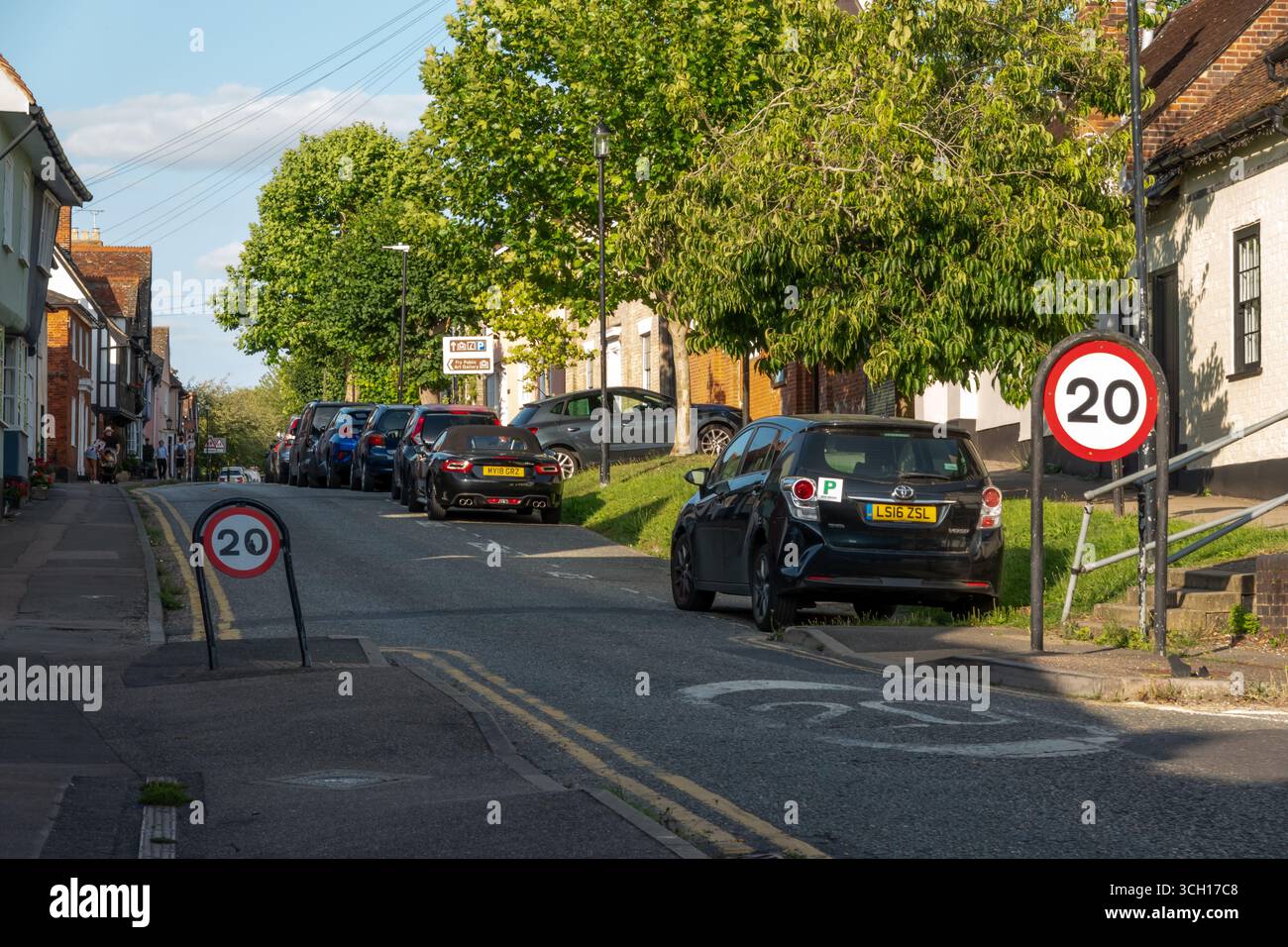 Castle Street in Saffron Walden, Essex, featuring parked cars and 20mph ...