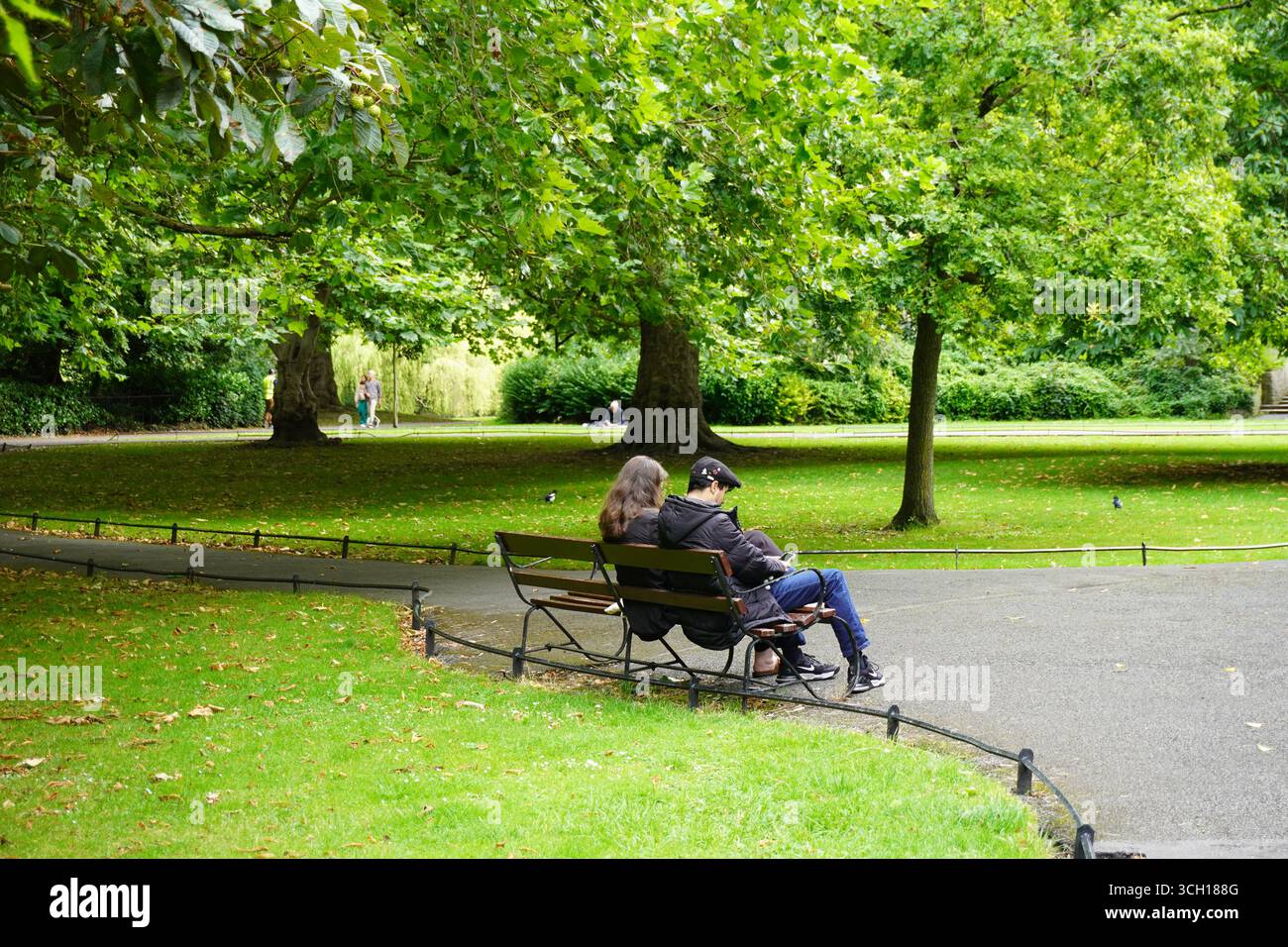 Man relaxes in park on hi-res stock photography and images - Alamy