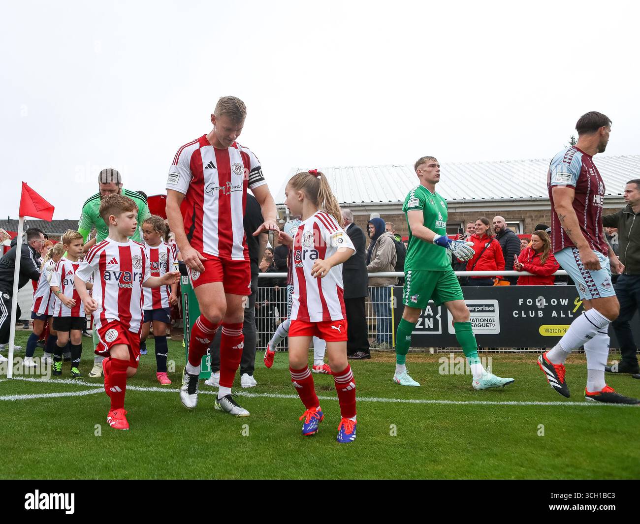 Brackley, UK. 30th August 2025. Gareth Dean of Brackley Town walks out ...