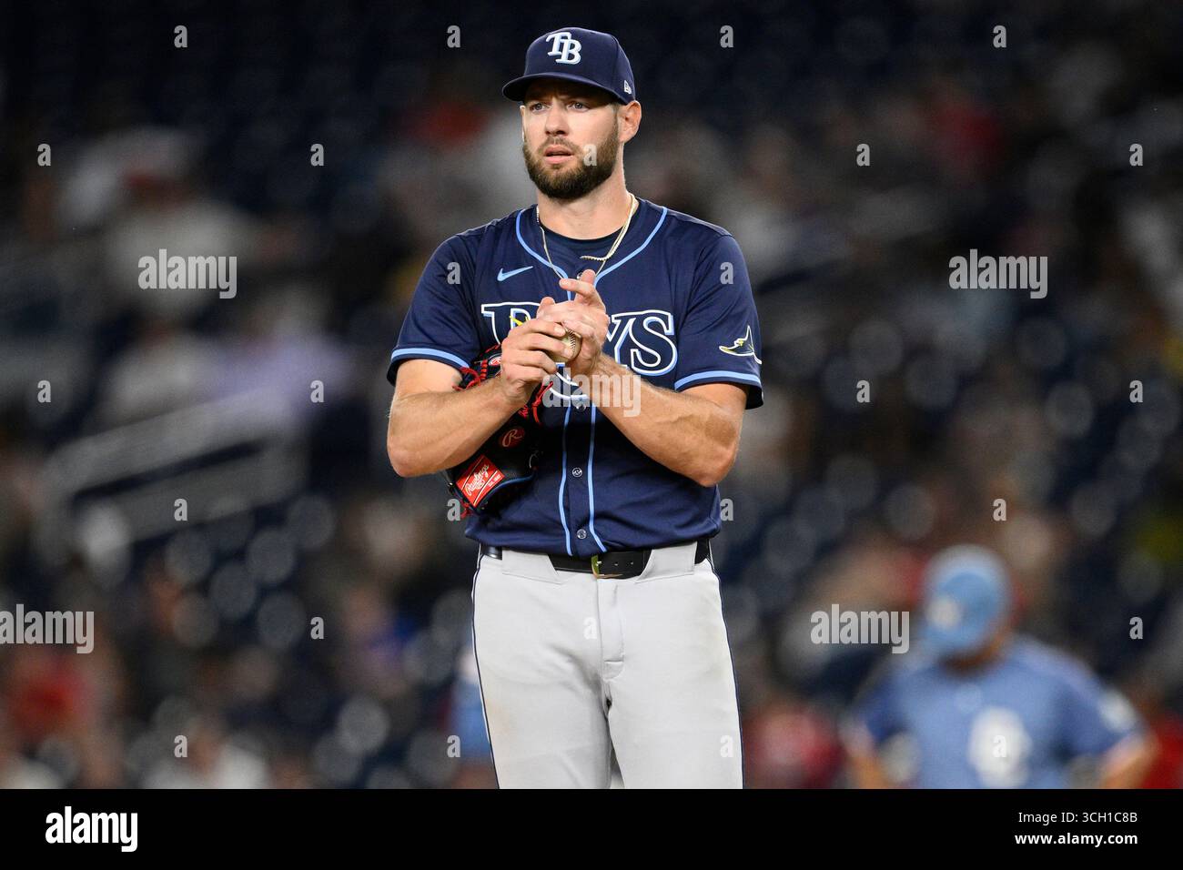 Tampa Bay Rays starting pitcher Adrian Houser (37) looks on during a ...