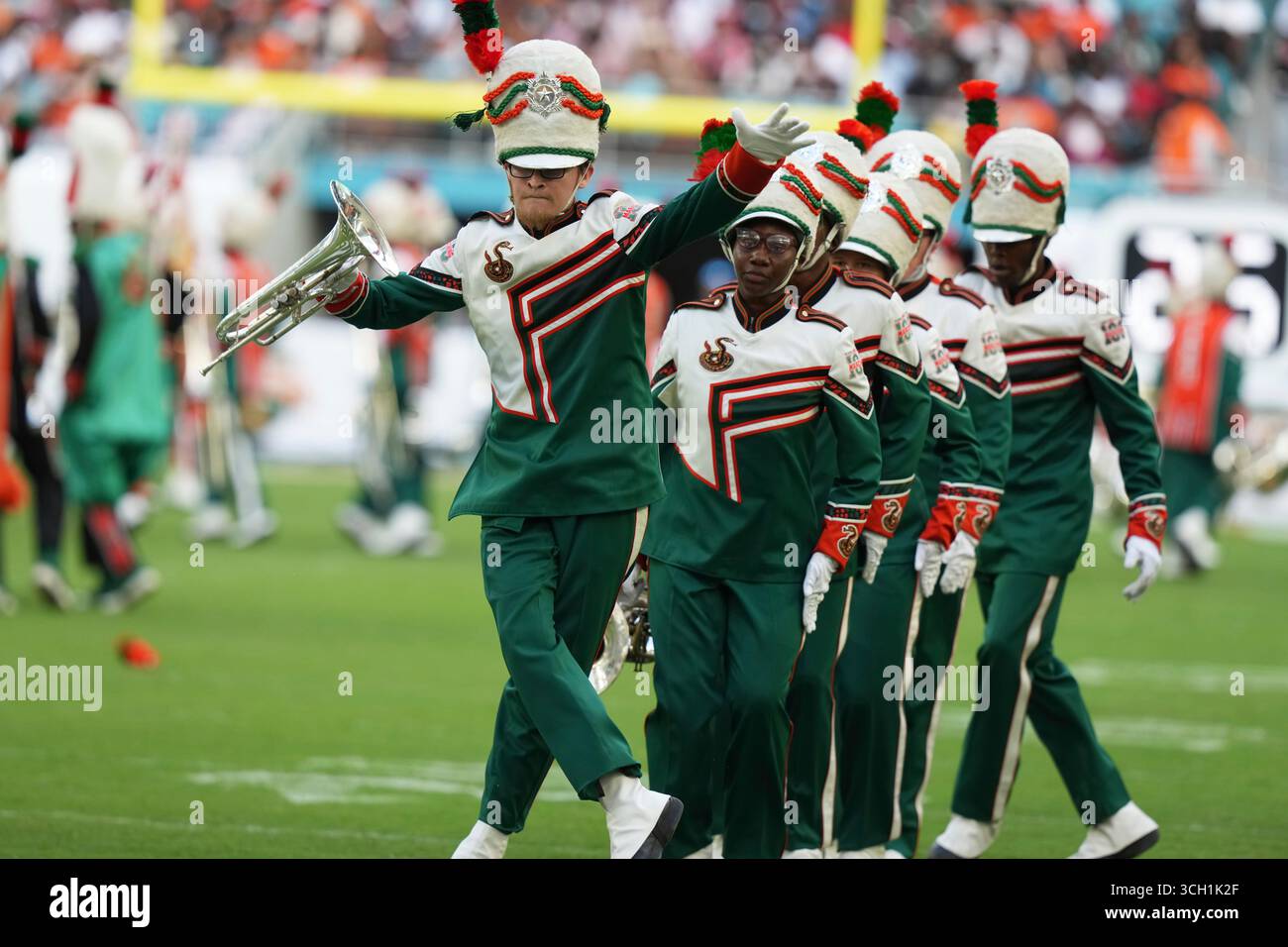 The Florida A&M marching band performs at halftime of the Orange Blossom Classic NCAA college ...