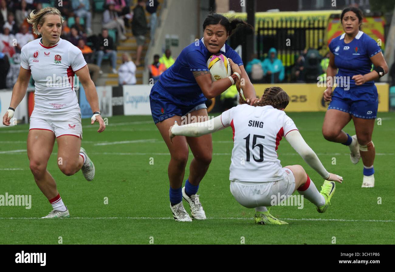 L-R England's(Red Roses)Claudia MacDonald and Samoa’s Harmony VATAU in ...