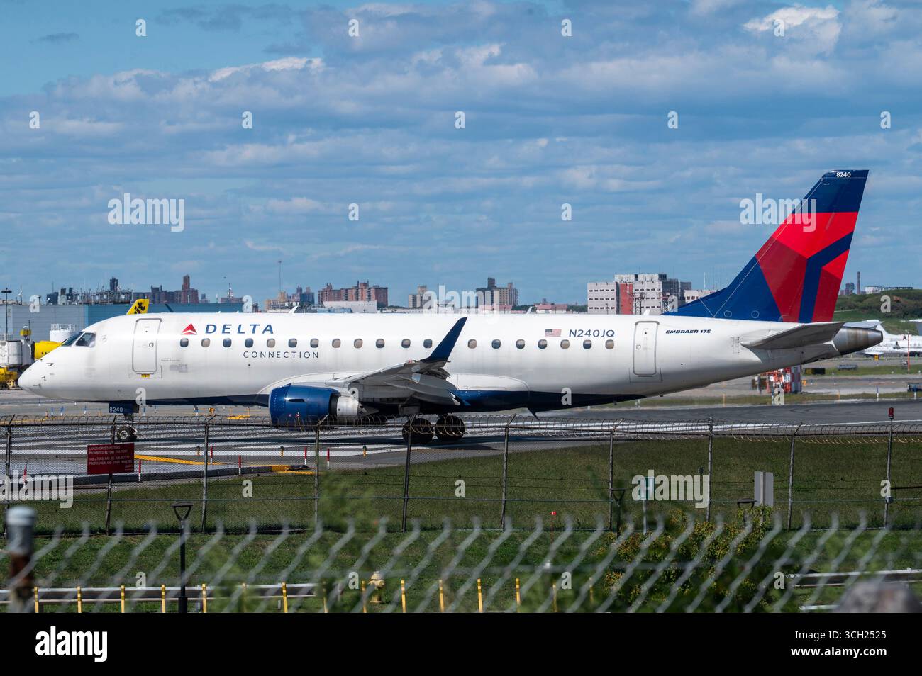 NEW YORK, NEW YORK - AUGUST 30: A Delta Connection Embraer ERJ-170-200 ...