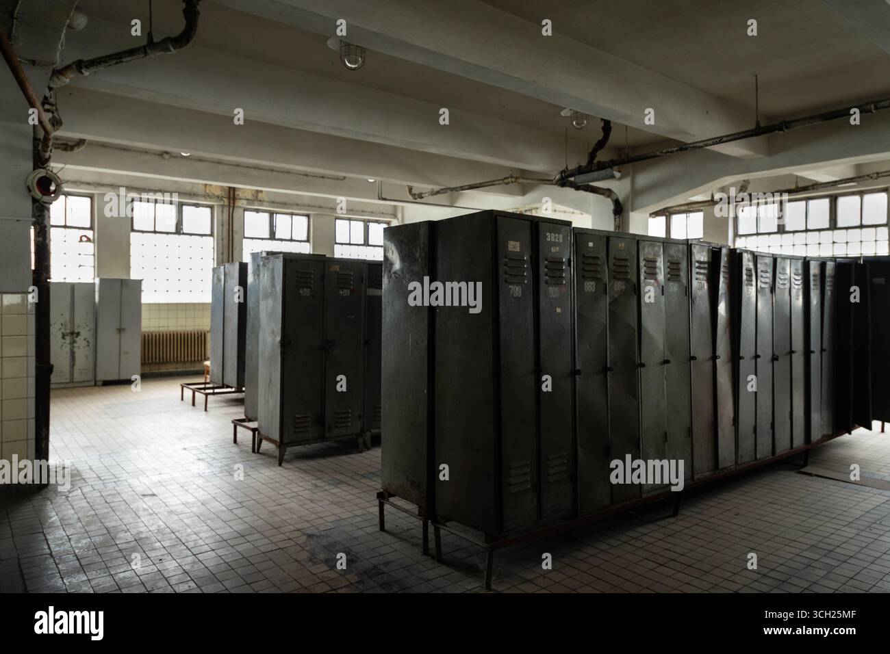 Historic miners’ lockers and benches inside the preserved dressing room ...